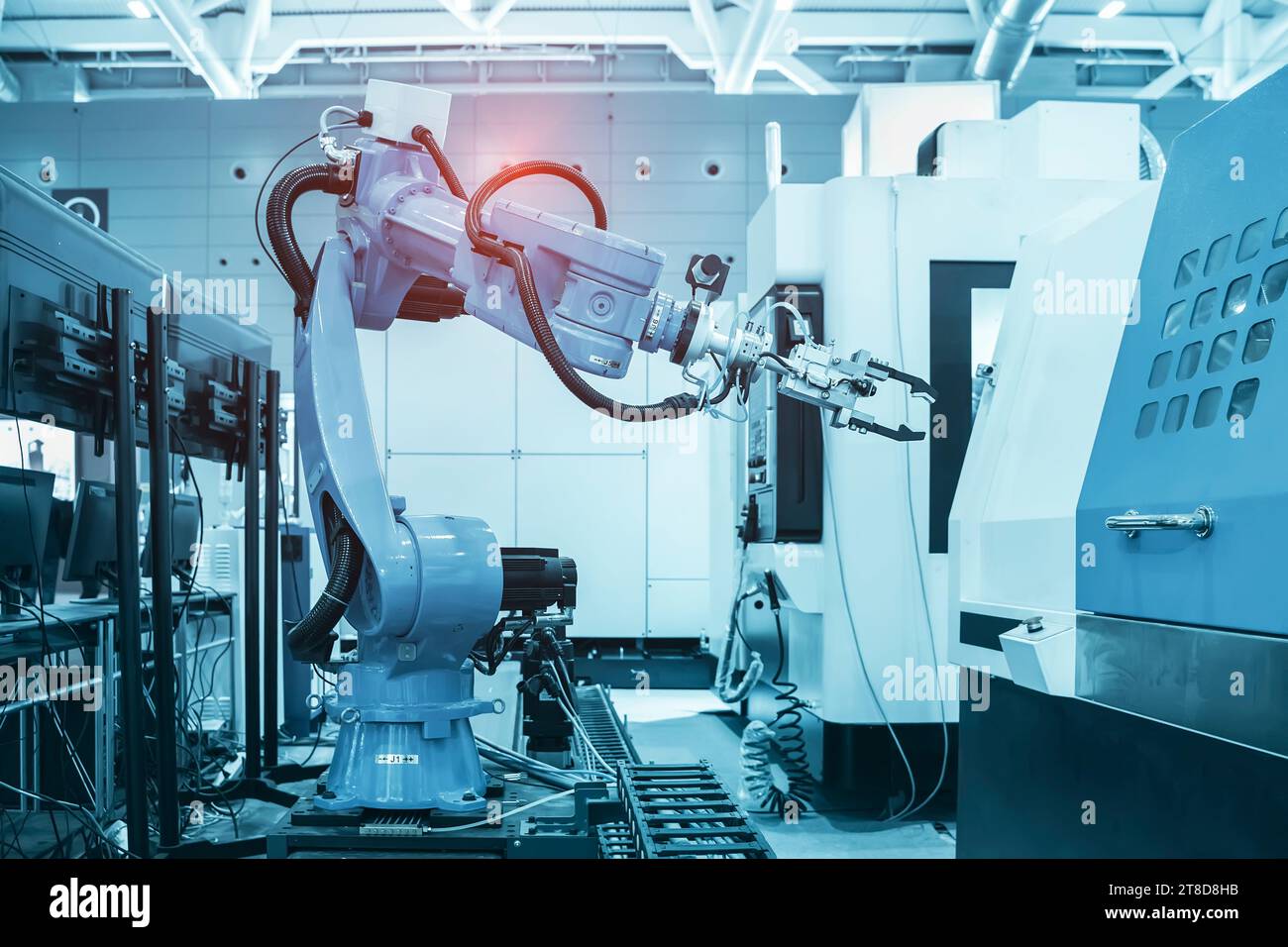 automatic arm catch for electronic assembly line. The robot for smart ...