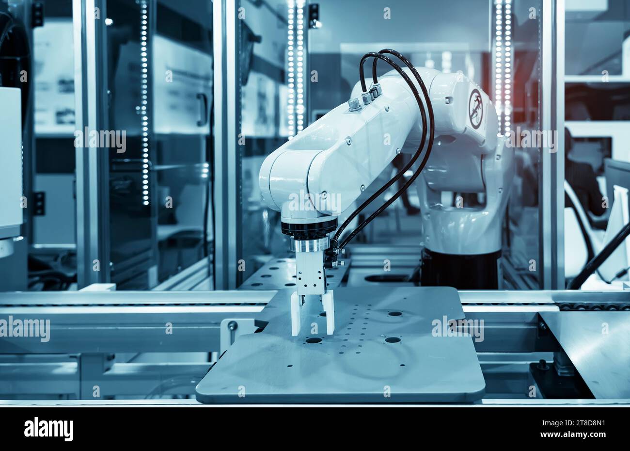 automatic robot arm machine tool at industrial manufacture factory ...