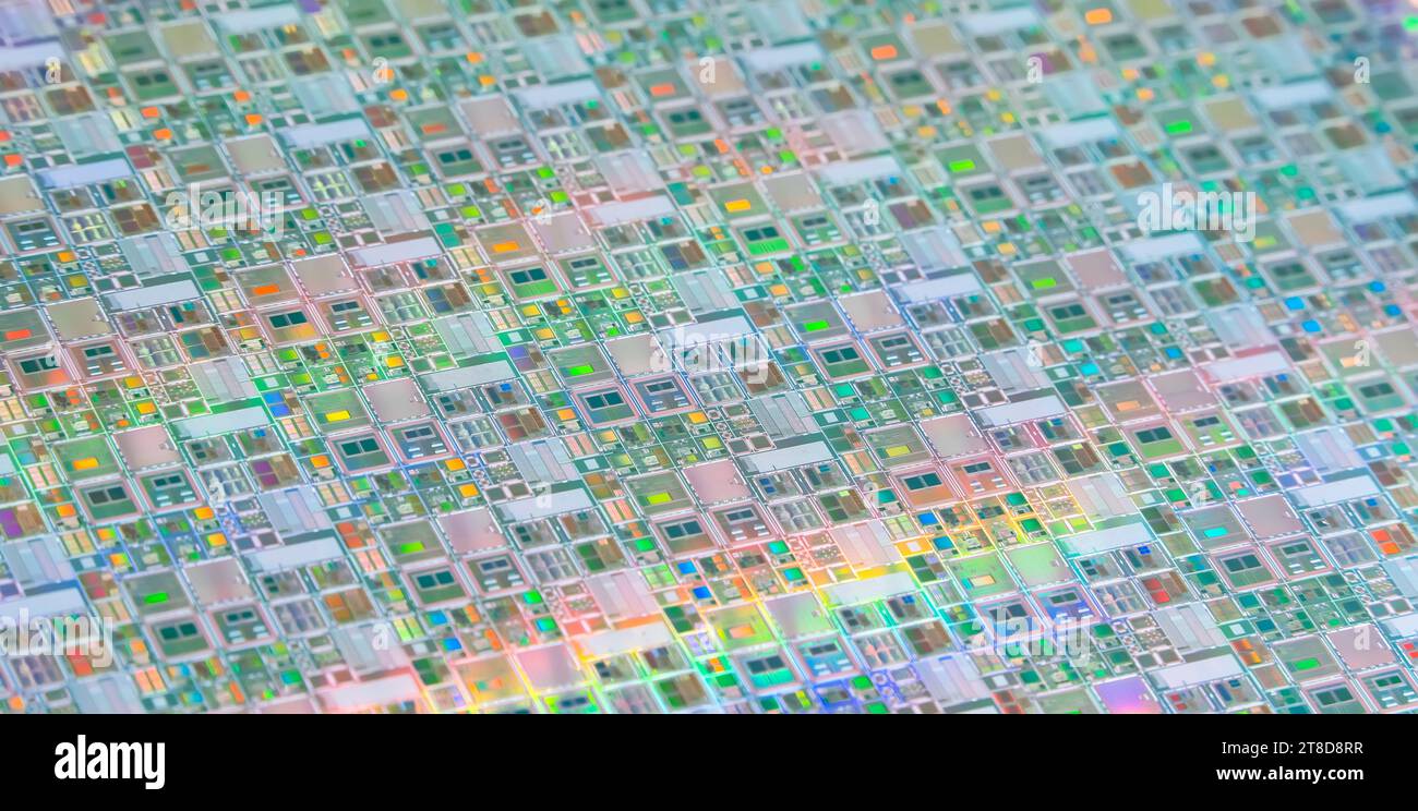 Silicon Wafers with microchips used in electronics for the fabrication ...