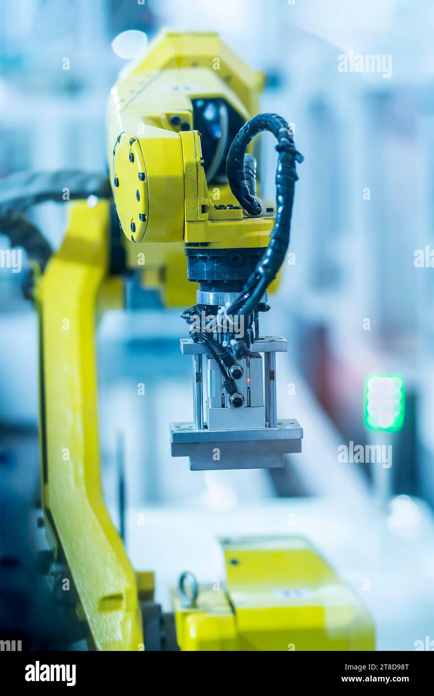 robotic hand machine tool at industrial manufacture factory Stock Photo ...
