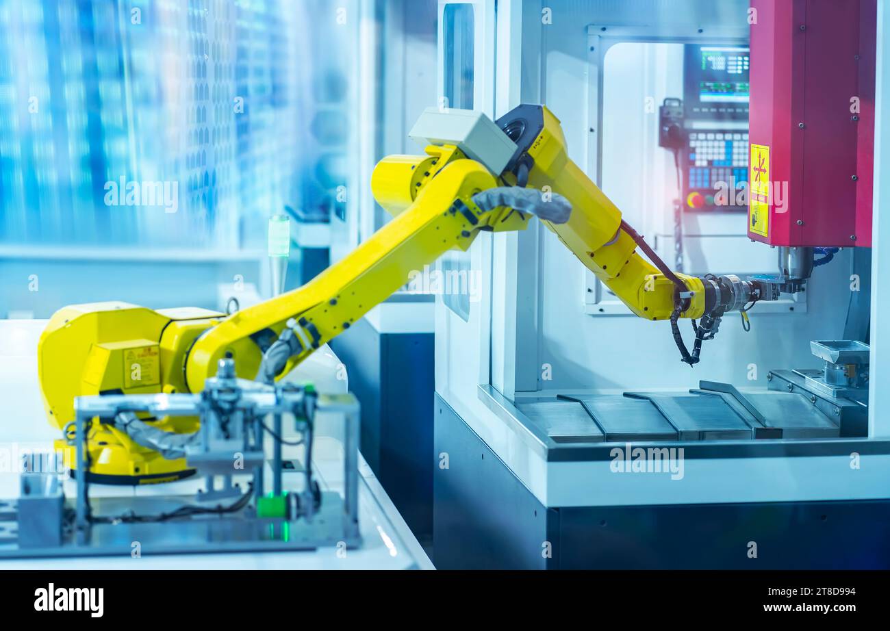 robotic hand machine tool at industrial manufacture factory Stock Photo ...