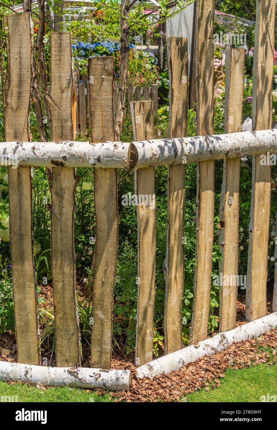 Birch fence with garden decorative Stock Photo - Alamy