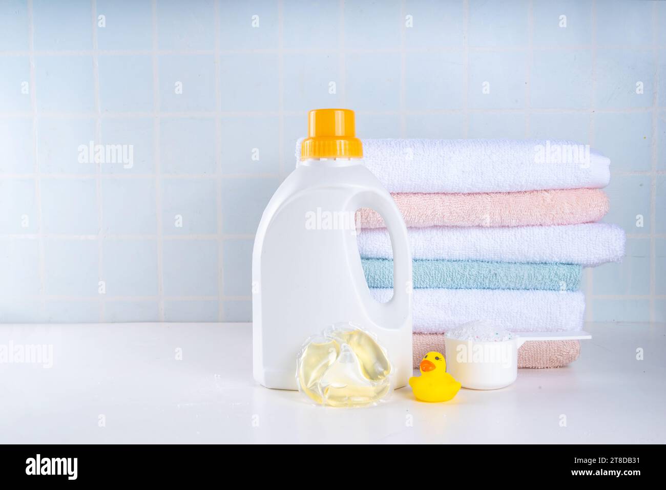 Laundry, washing and cleaning concept. Stack of clean towels, with ...