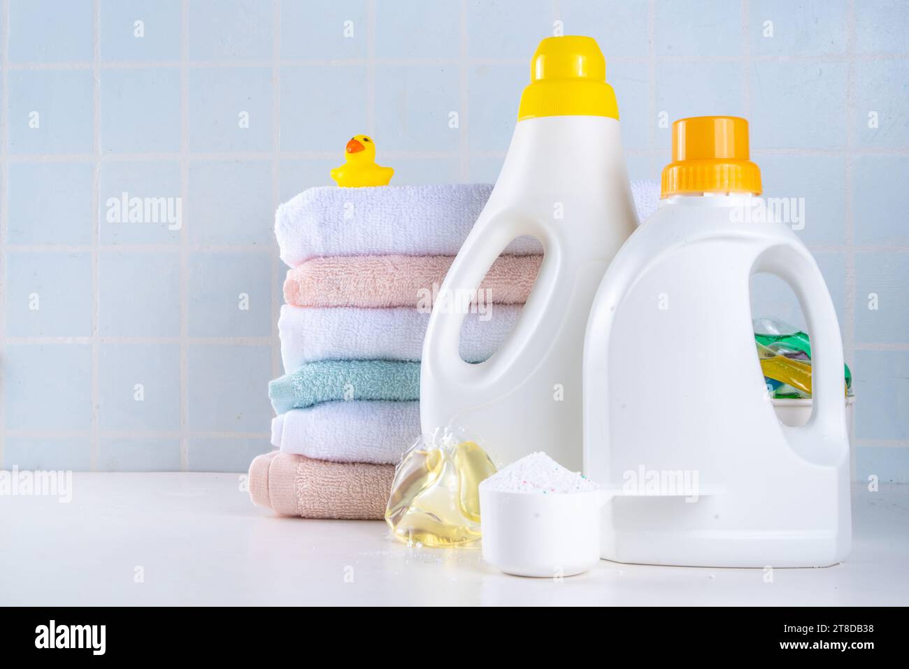 Laundry, washing and cleaning concept. Stack of clean towels, with ...