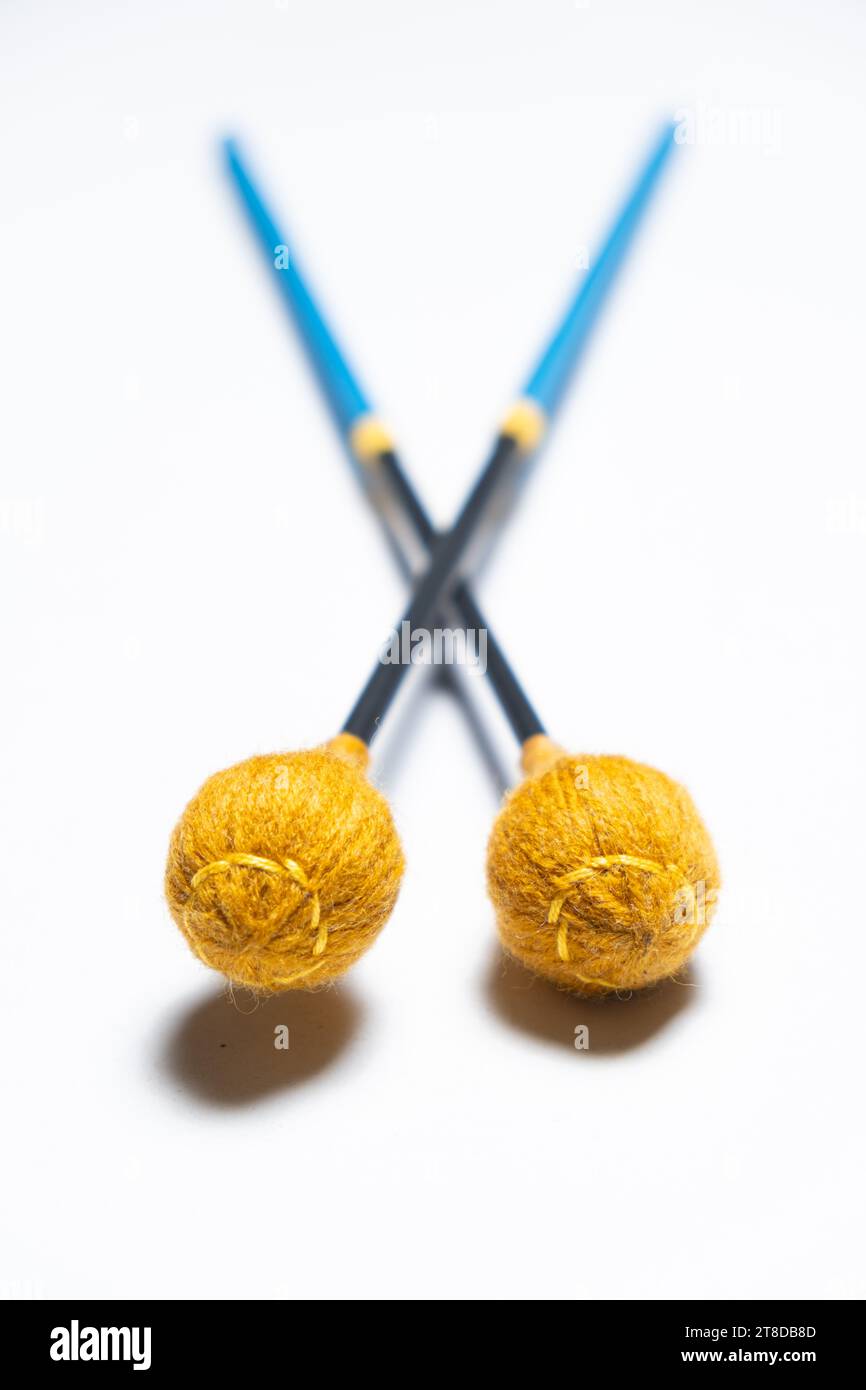 Handmade xylophone sticks on white background Stock Photo - Alamy