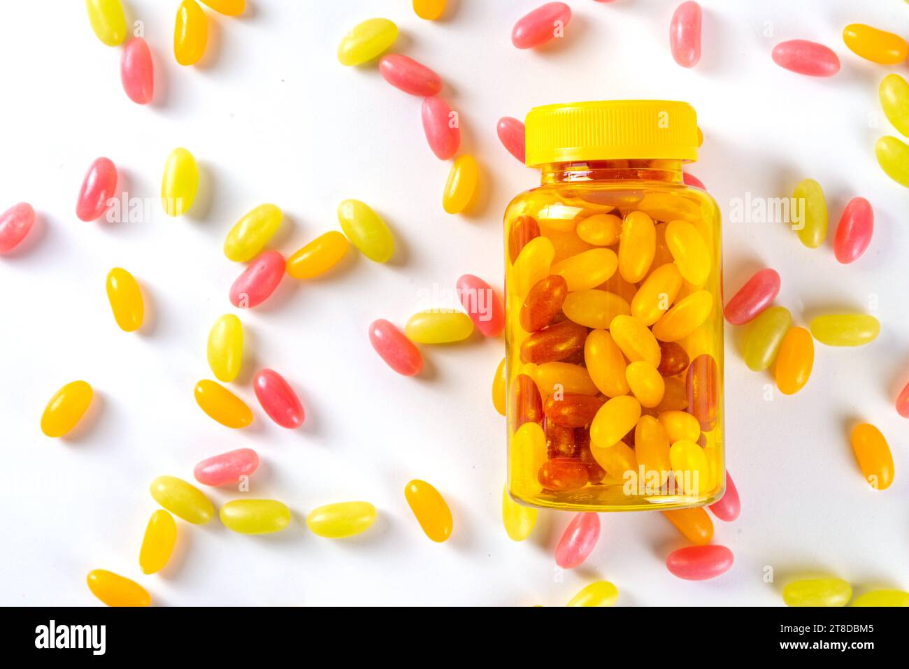 Gummy Vitamins and supplement for adults. Woman eats sweet jelly ...