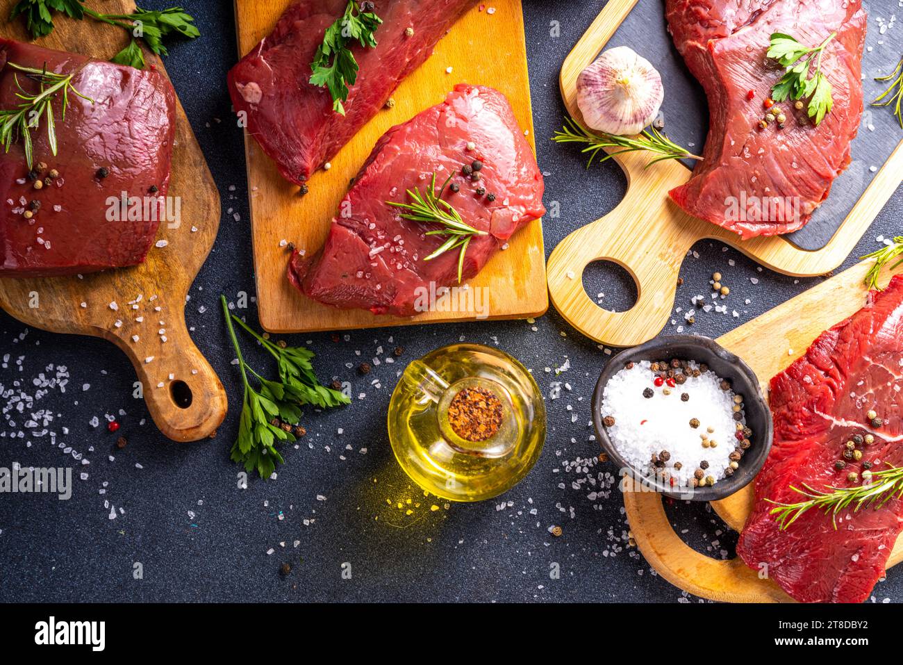 Cooking food background. Various cuts of raw fresh veal, beef, red meat ...