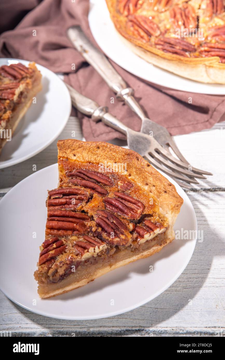 Traditional autumn pecan pie, American Thanksgiving holiday cake with ...