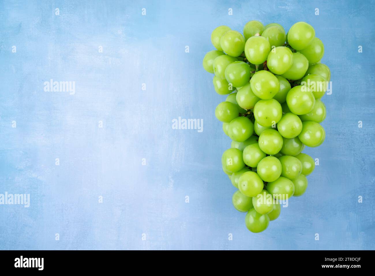 Fresh of Shine Muscat Grape on wooden blue background Stock Photo - Alamy