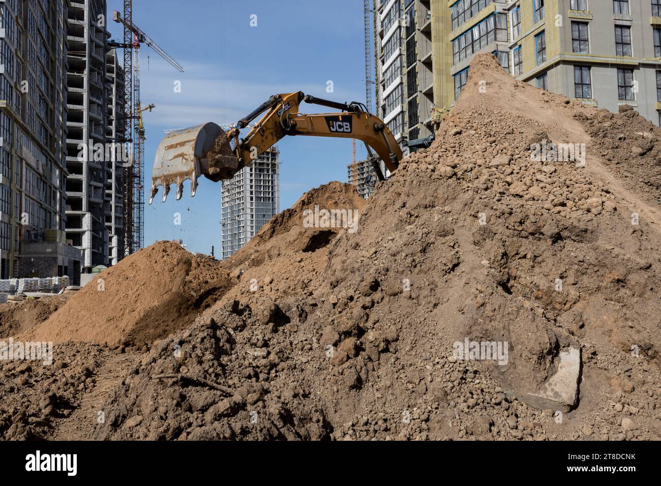 Minsk, Belarus, November 20, 2023 - Modern JCB excavator on the highway ...