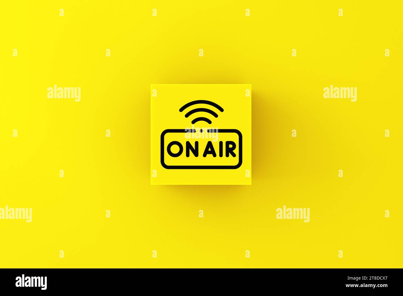 Live broadcasting and news concept. On air symbol on a yellow cube ...