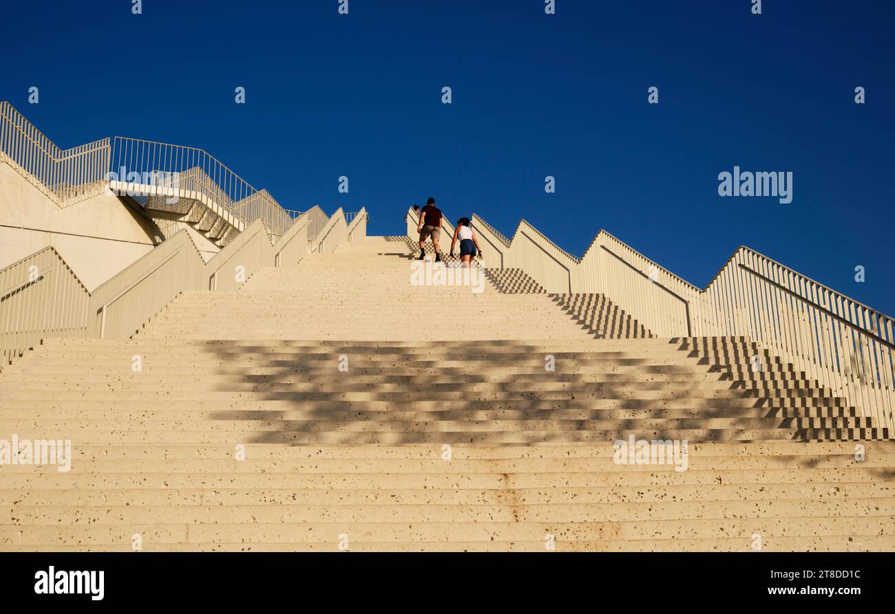 Tourists climb up the Piramida, pyramid that was originally built as a ...