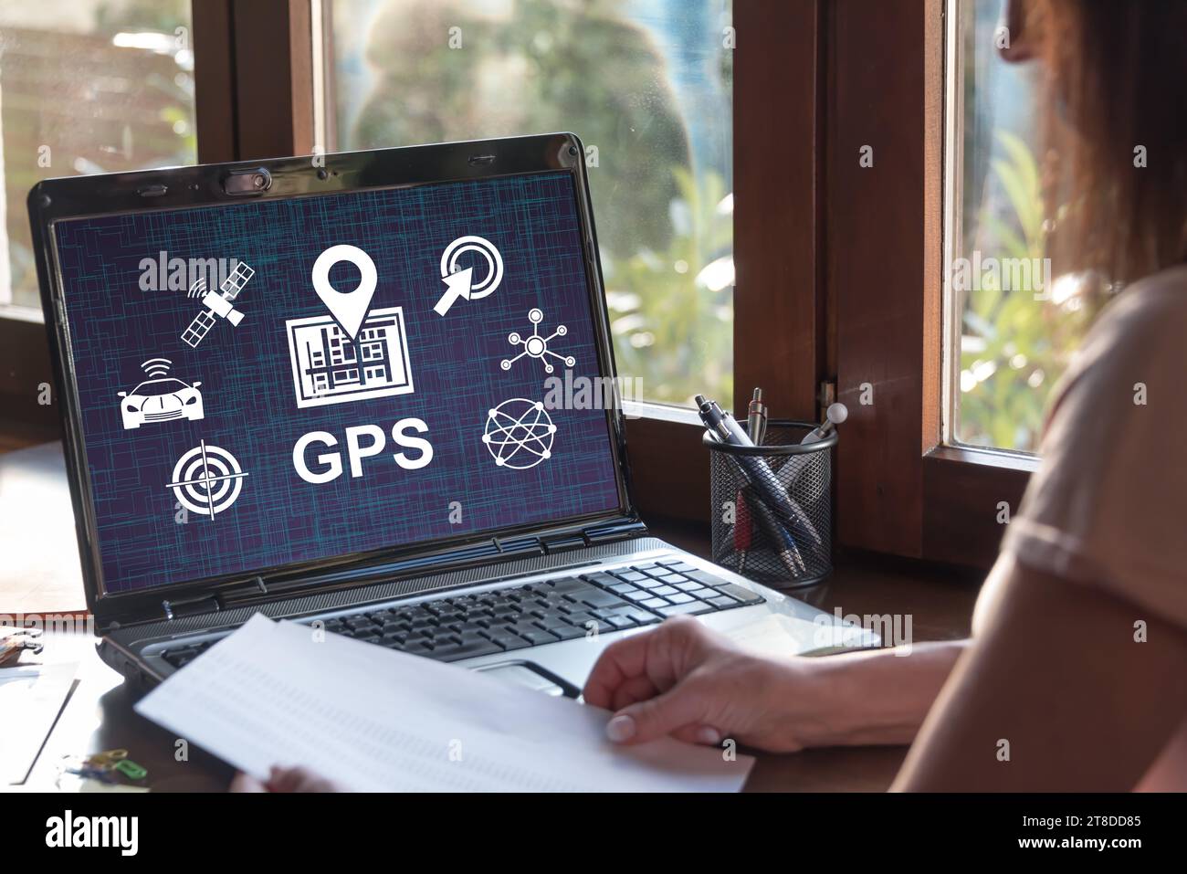 Laptop screen displaying a gps concept Stock Photo - Alamy