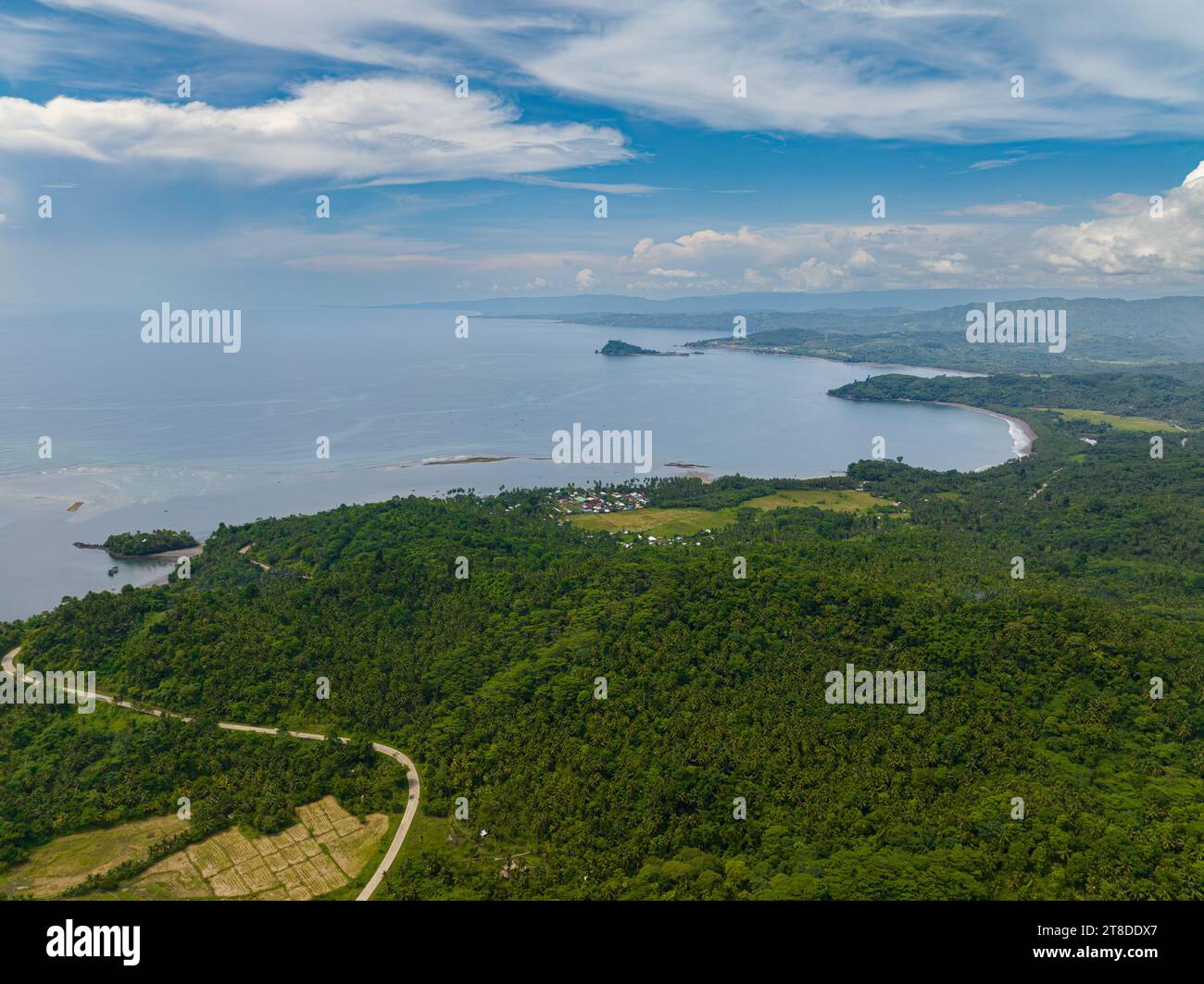 Tropical island with houses in costal area. Mindano, Philippines Stock ...