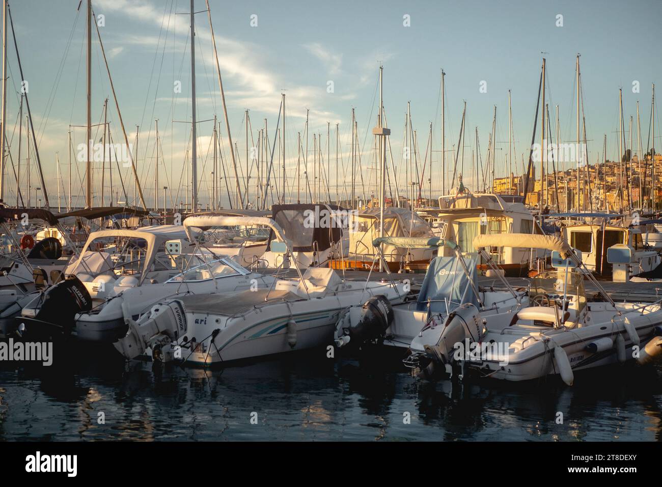 Yachts and boats in the harbour of Menton, in front of colorful ...