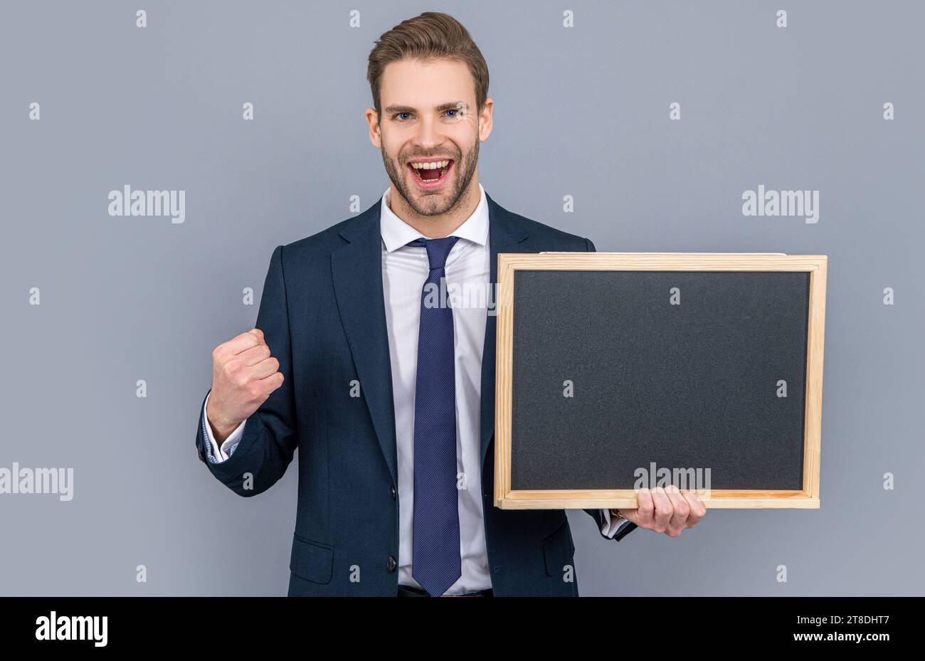 Business idea advertisement. Businessman hold blackboard isolated on ...