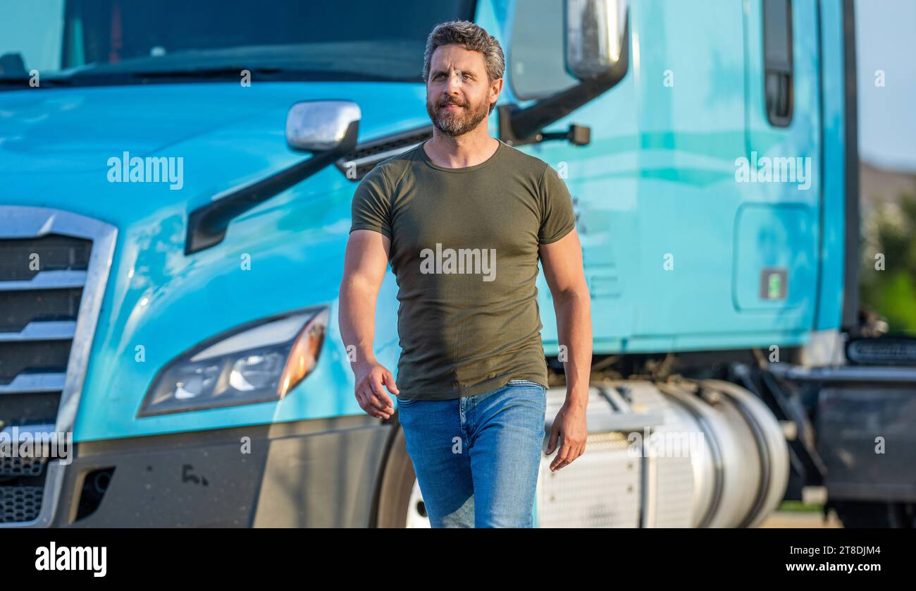 man driver near lorry. Semi trucks vehicle. Trucking owner. hispanic ...