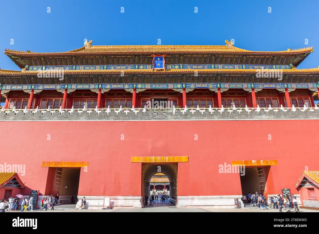 People entering the Meridian Gate in the Forbidden City in Beijing ...