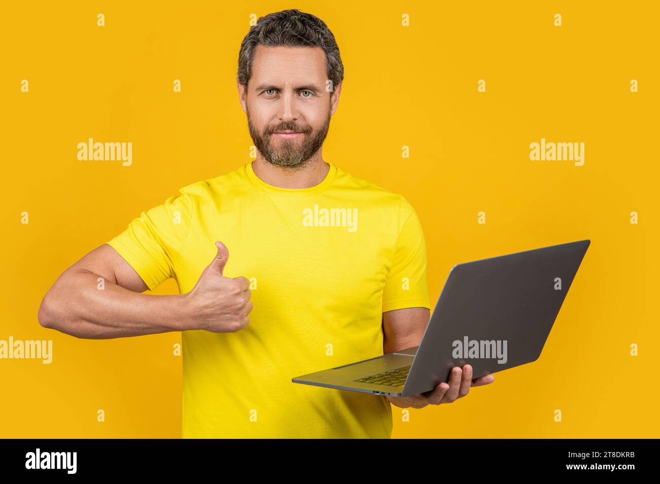 man programmer isolated on yellow, thumb up. man programmer on ...