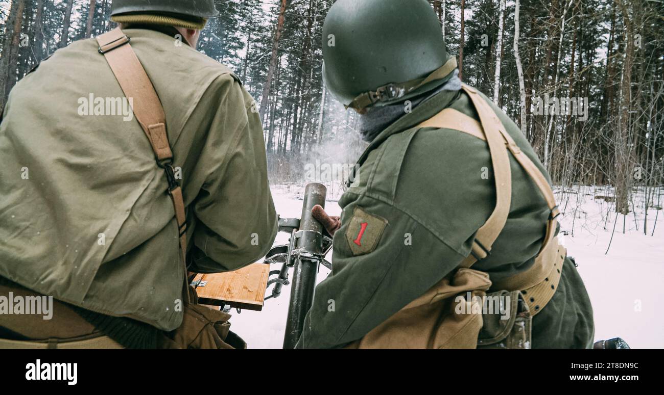 Back View On Re-enactors Dressed As American Infantry Soldiers Fire ...