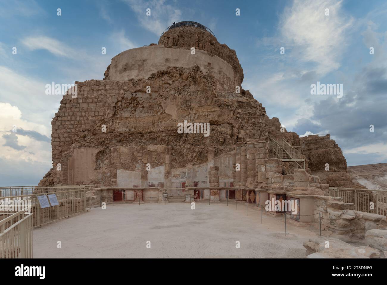 a barren desert landscape, featuring Masada, an ancient fortification ...