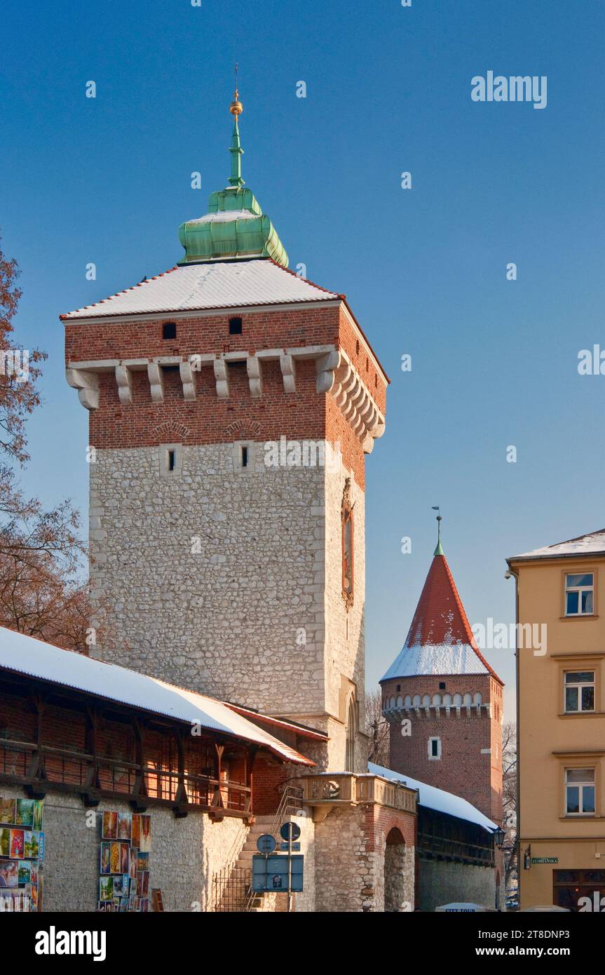 Medieval Florian Gate and Basamonik Tower in winter, Krakow, Poland ...