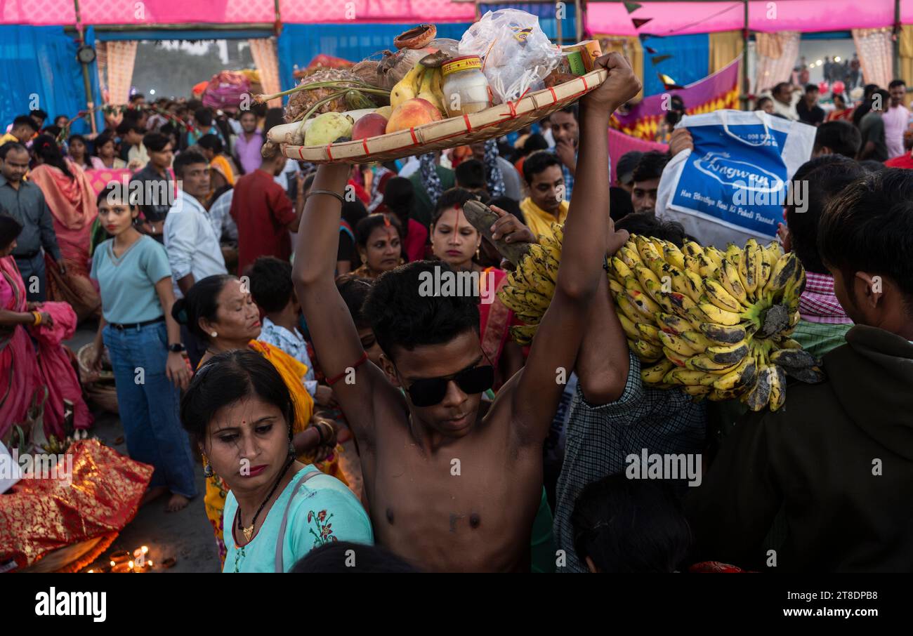 Guwahati, Assam, India. 19th Nov, 2023. Devotees carry puja ingredients ...