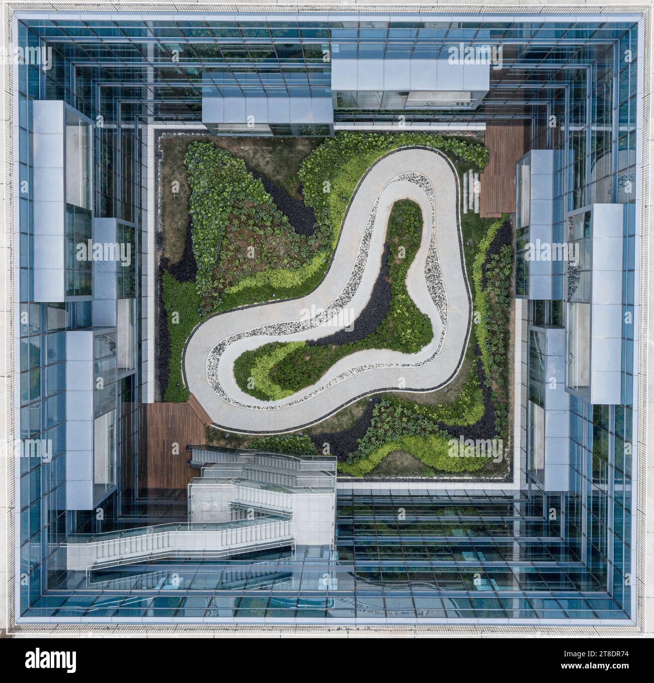 An aerial view of a small garden in the atrium of a high-tech company ...