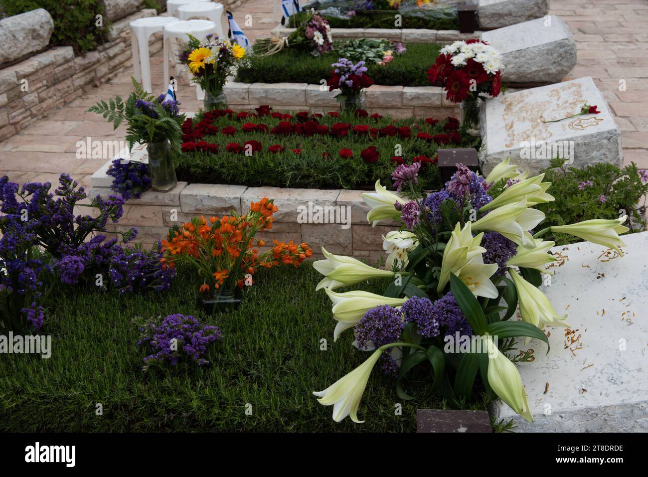 Flowers are laid on the grave of a fallen soldier in Jerusalem's Har ...