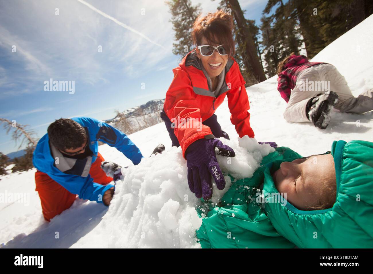 Parents children playing in winter hi-res stock photography and images ...