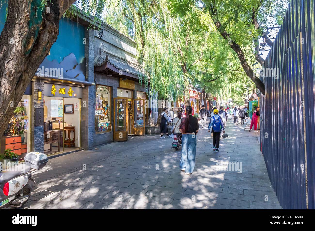 People walking the narrow streets of the hutongs in Beijing, China ...
