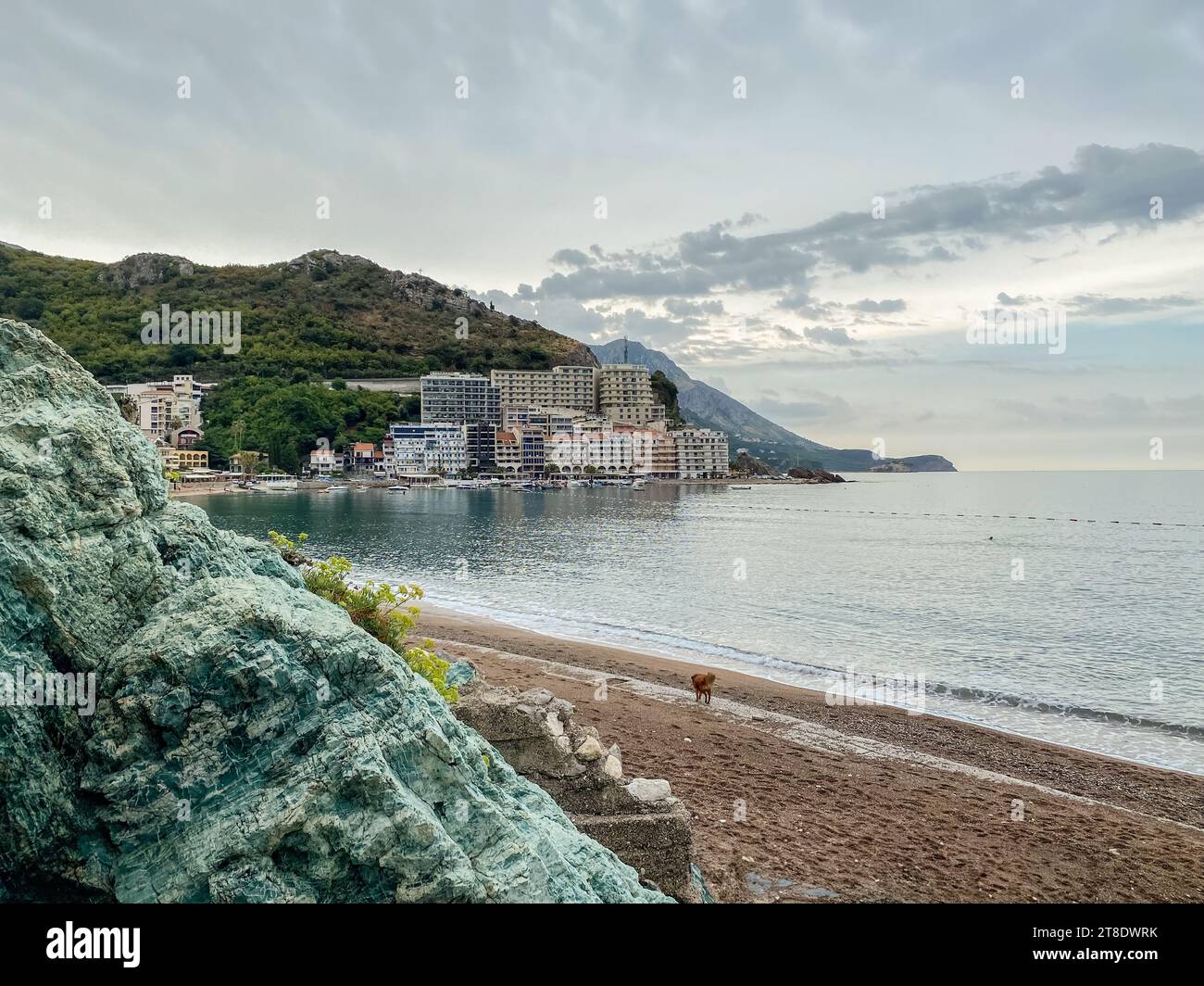 View from blue rock on empty beach in coastal town Rafailovici ...
