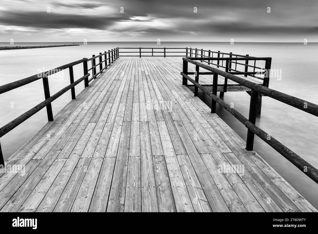 Santa Pola salt flats pier Stock Photo - Alamy