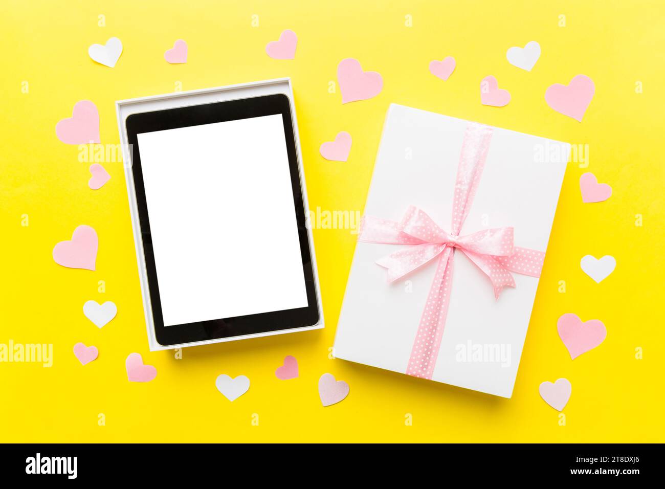 Gift box of open tablet for the holidays with a bow top view Stock ...