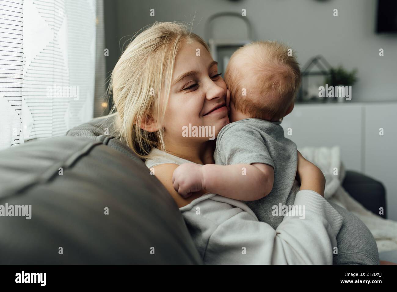 Caucasian girl with baby sister hi-res stock photography and images - Alamy