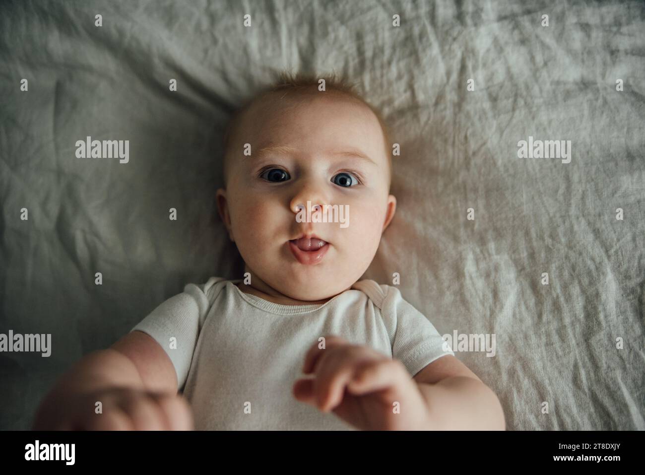 Child sticking out tongue hi-res stock photography and images - Alamy