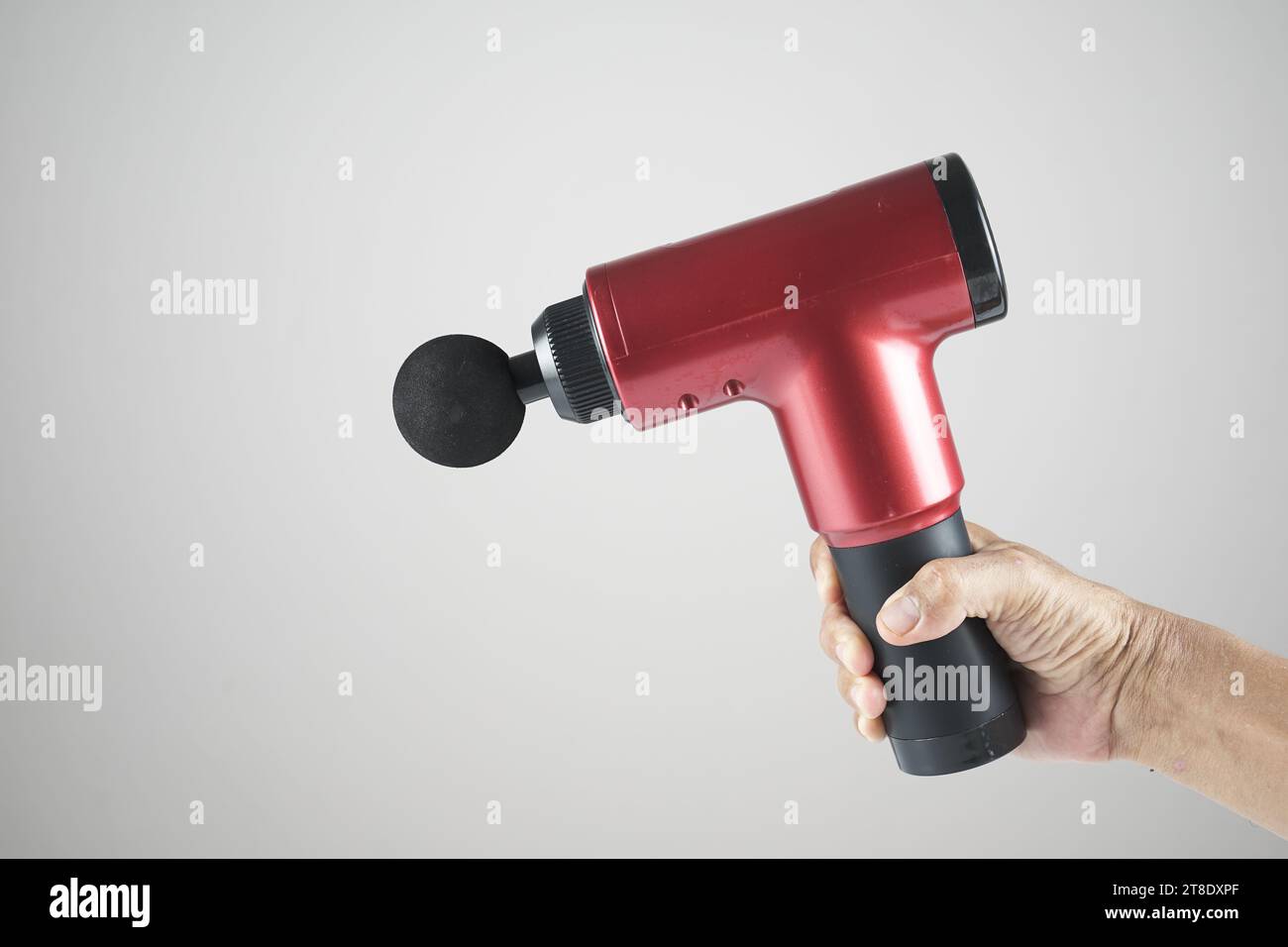 Hand holding Portable Electric massage gun High Frequency Vibration ...