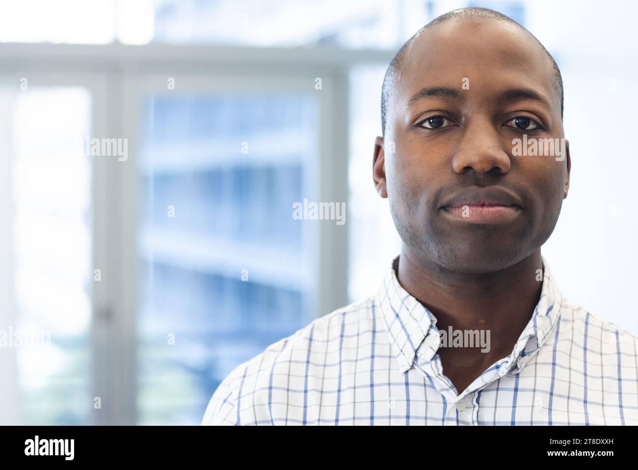Portrait Of African American Man In Hospital Waiting Room With Copy
