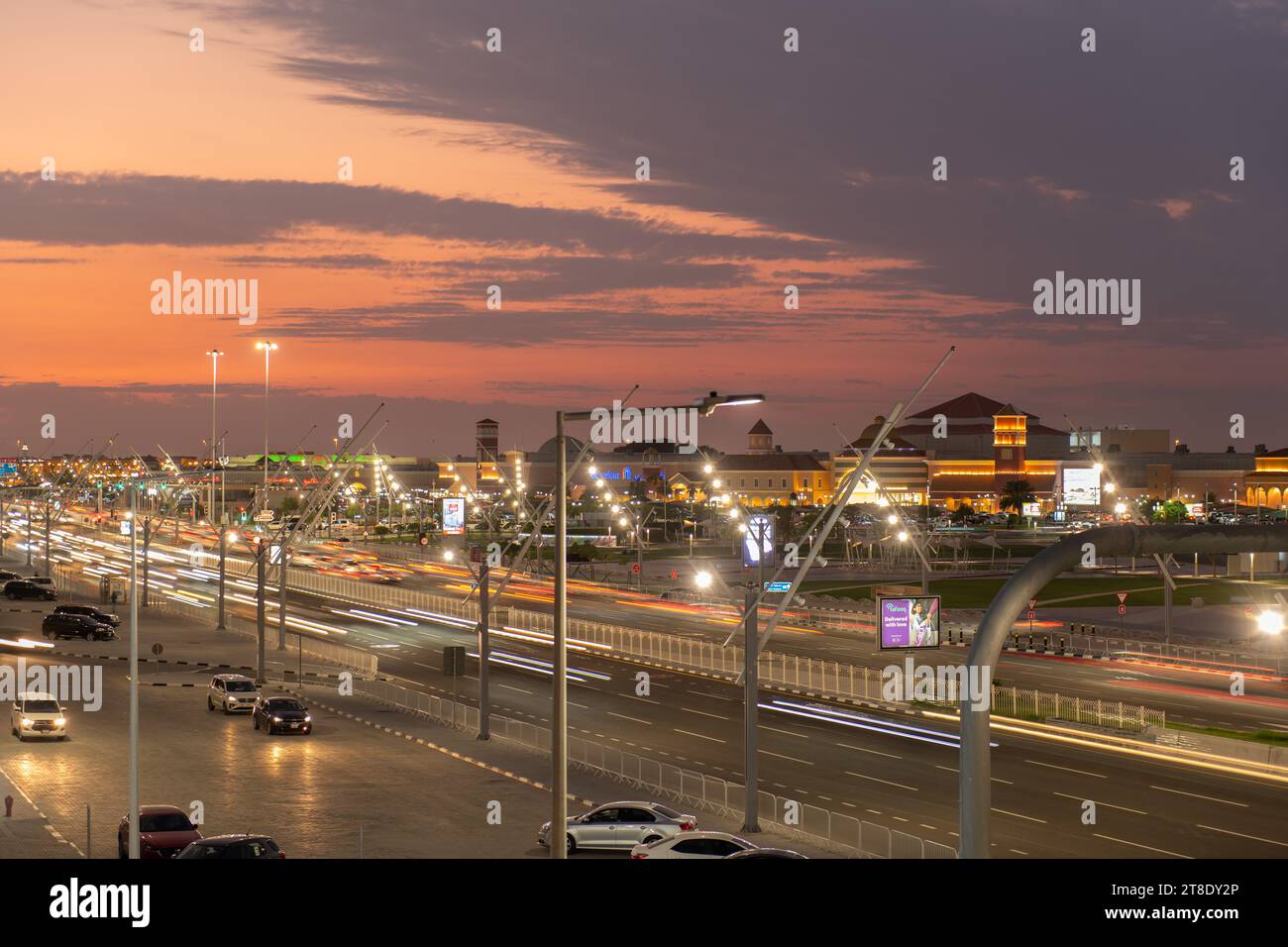 Doha, Qatar - November 16, 2023: Doha Roads and traffic light trail at ...