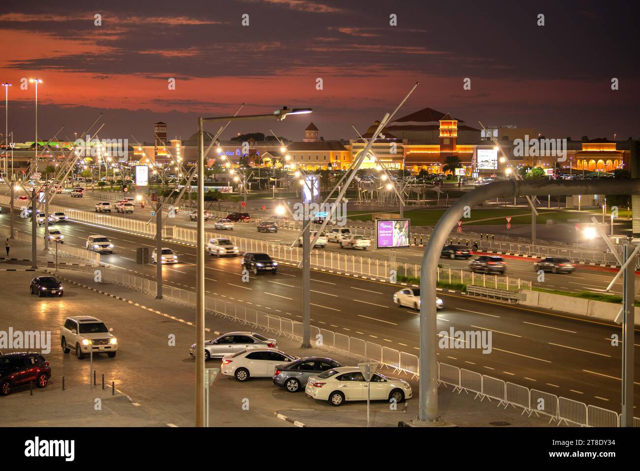 Doha, Qatar - November 16, 2023: Doha Roads and traffic light trail at ...