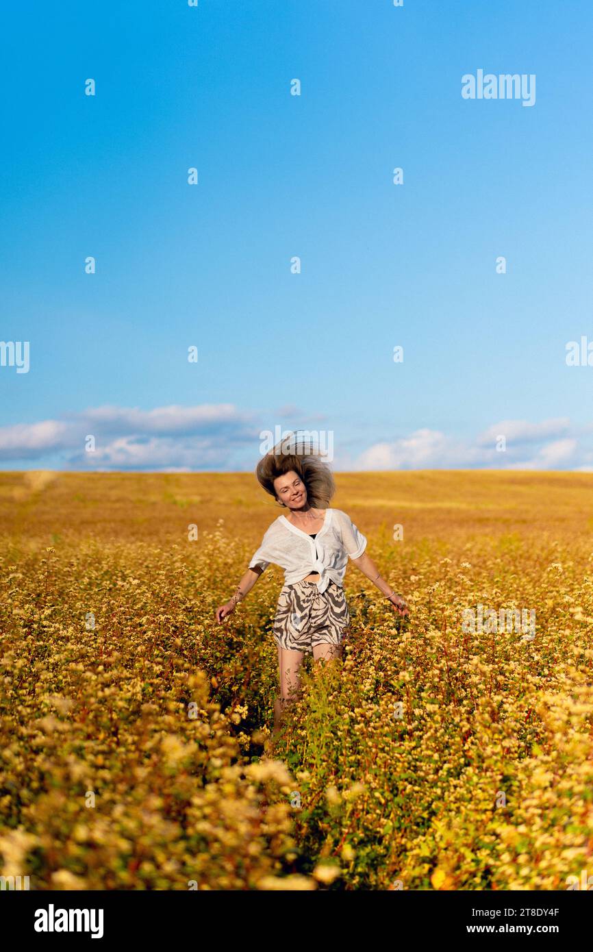 Young woman runs in summer hi-res stock photography and images - Alamy