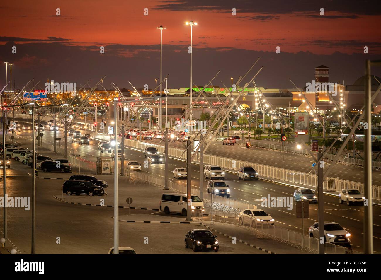 Doha, Qatar - November 16, 2023: Doha Roads and traffic light trail at ...