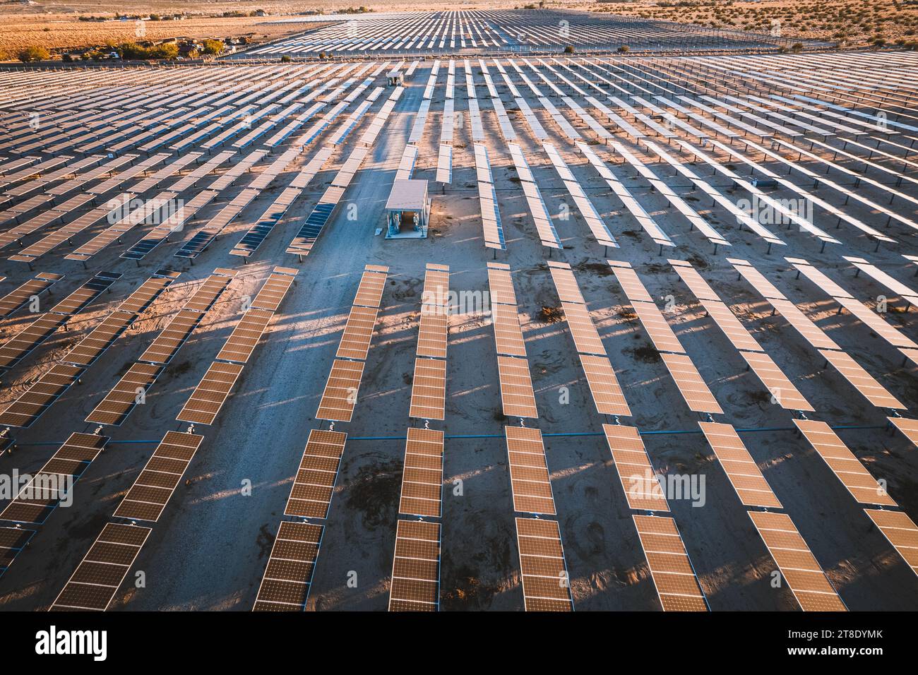 Aerial view of industrial sized solar panel farm in California desert ...