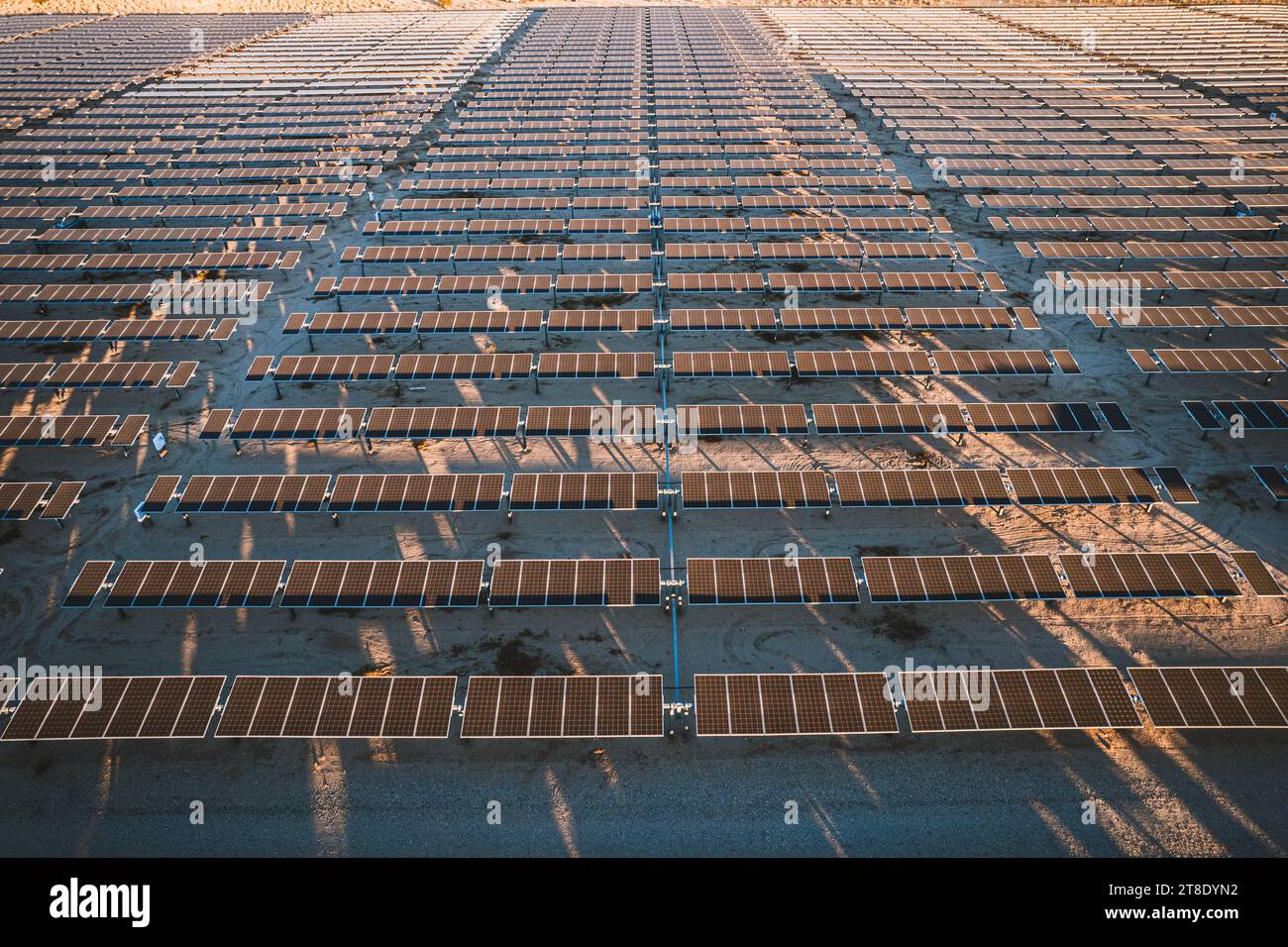 Aerial view of industrial sized solar panel farm in California desert ...