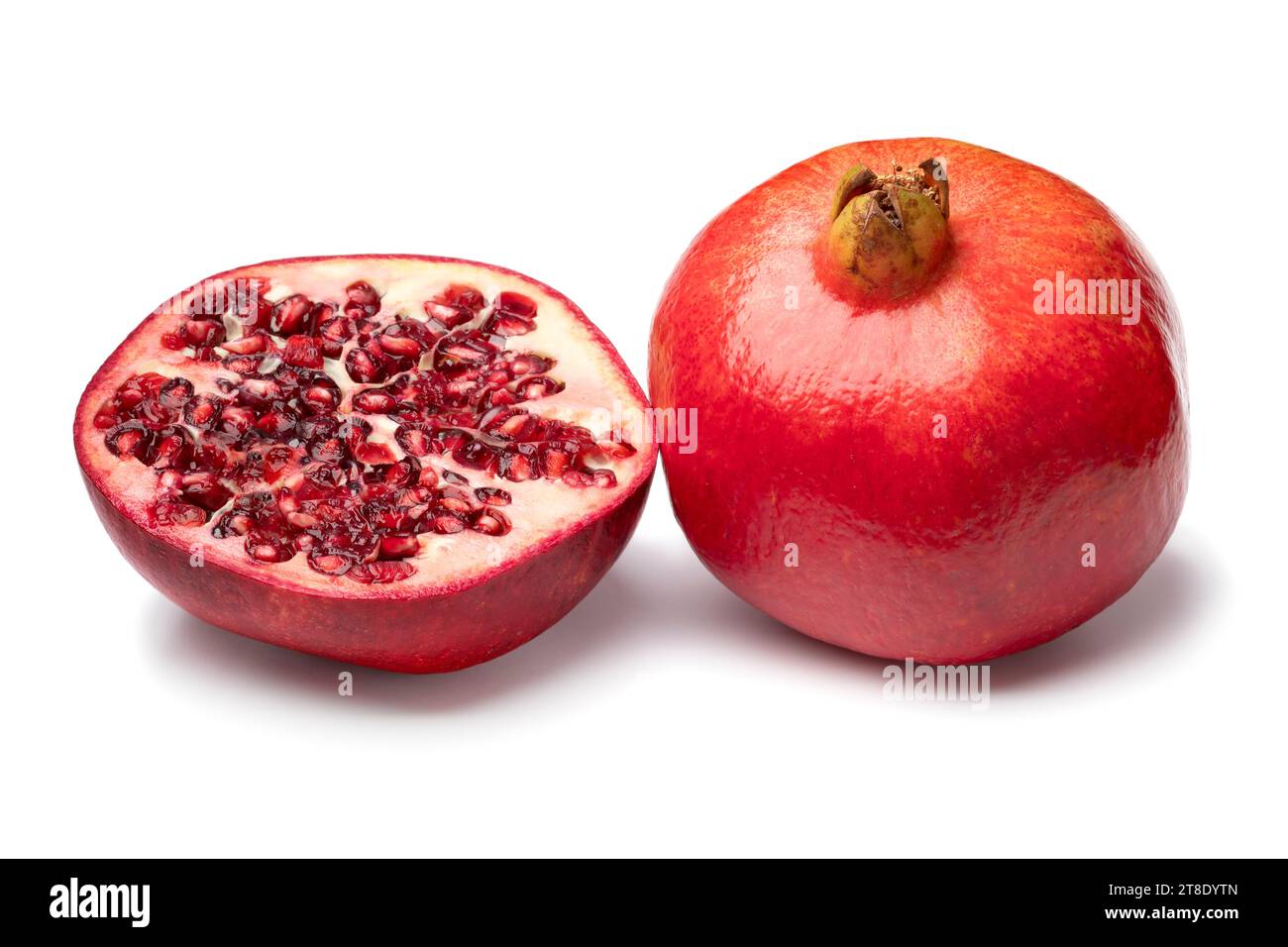 Ripe pomegranate fruit with half isolated on white background Stock ...