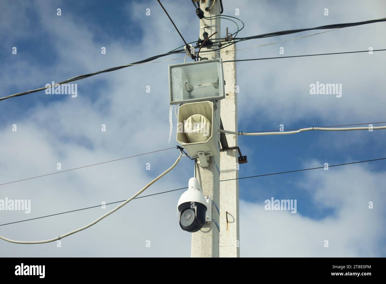 Surveillance camera on the pole. Outdoor Loudspeaker Stock Photo - Alamy
