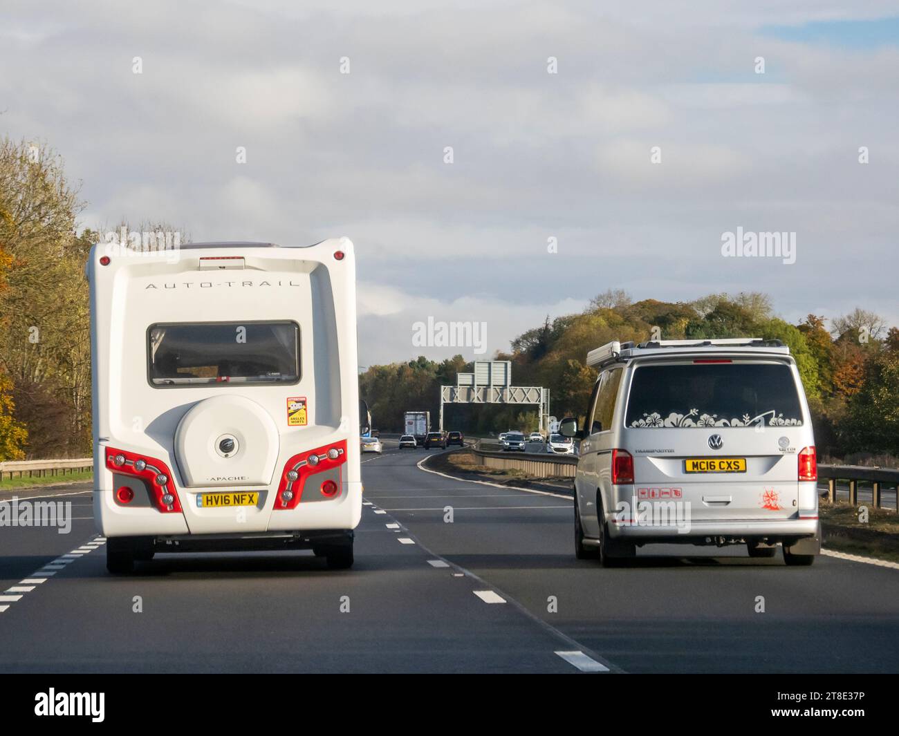 A motor home and camper van on the motorway near Glasgow, Scotland, UK ...