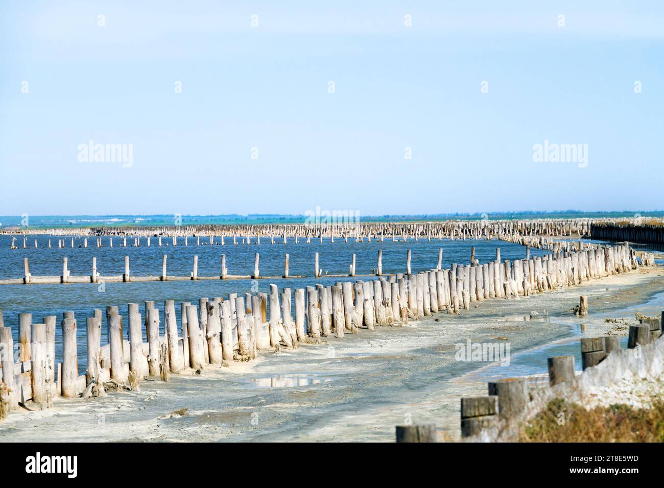 An ancient abandoned salt factory, saltworks. The remains of wooden ...