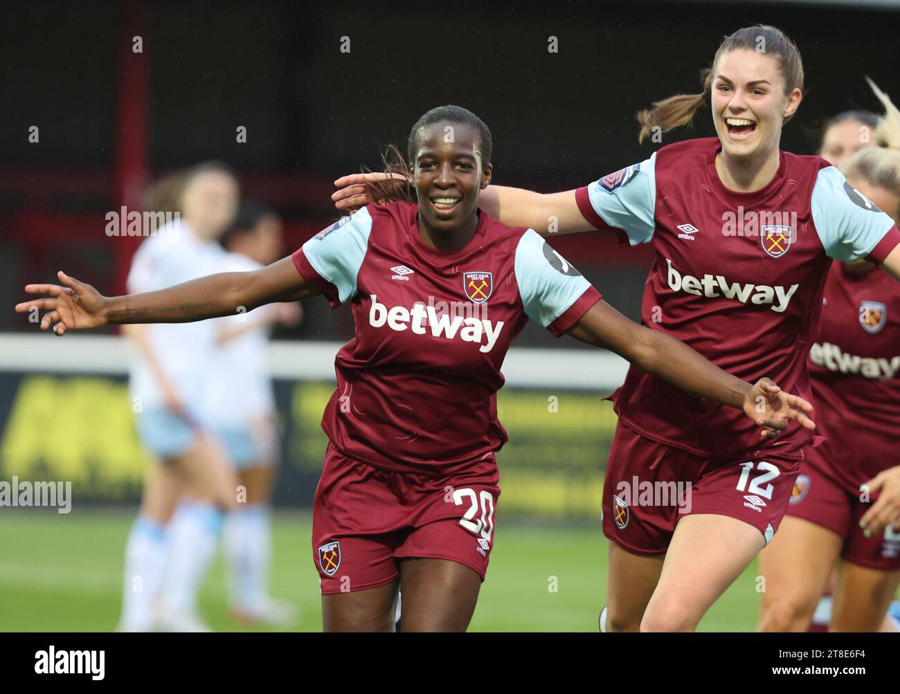 Viviane Asseyi of West Ham United WFC celebrates her goal with Emma ...