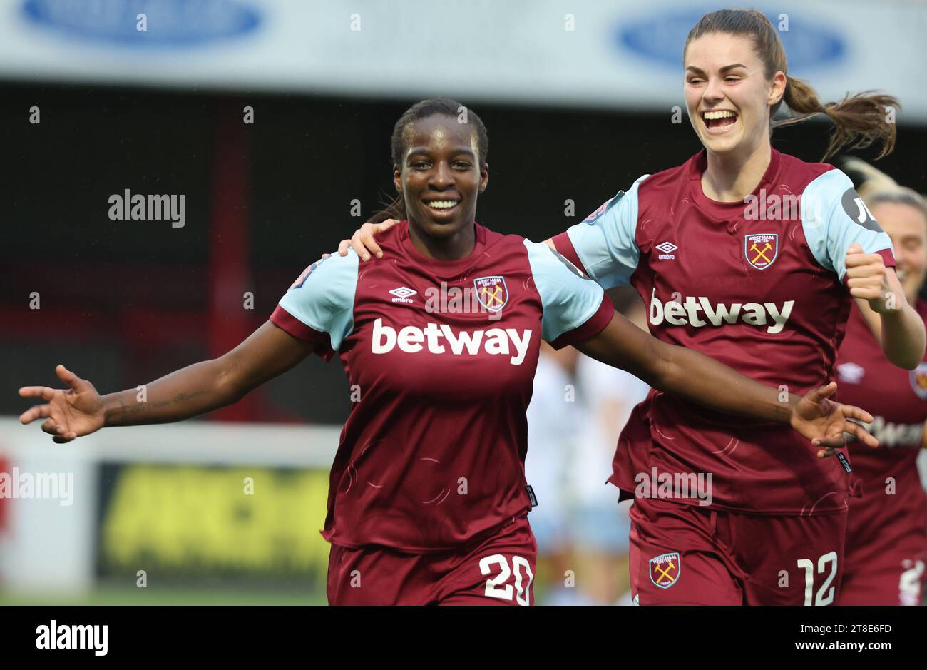 Viviane Asseyi of West Ham United WFC celebrates her goal with Emma ...